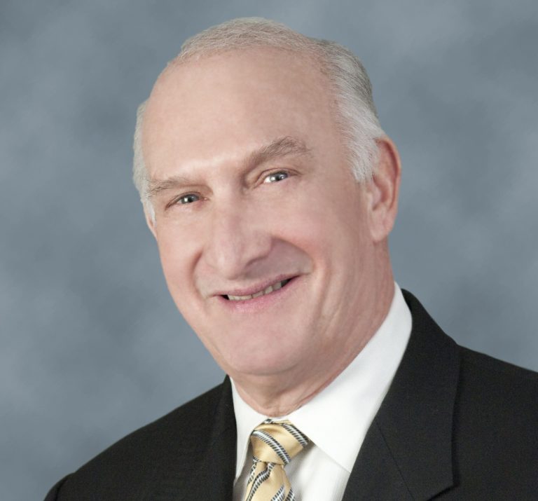John B. Evans - The Sun Times News