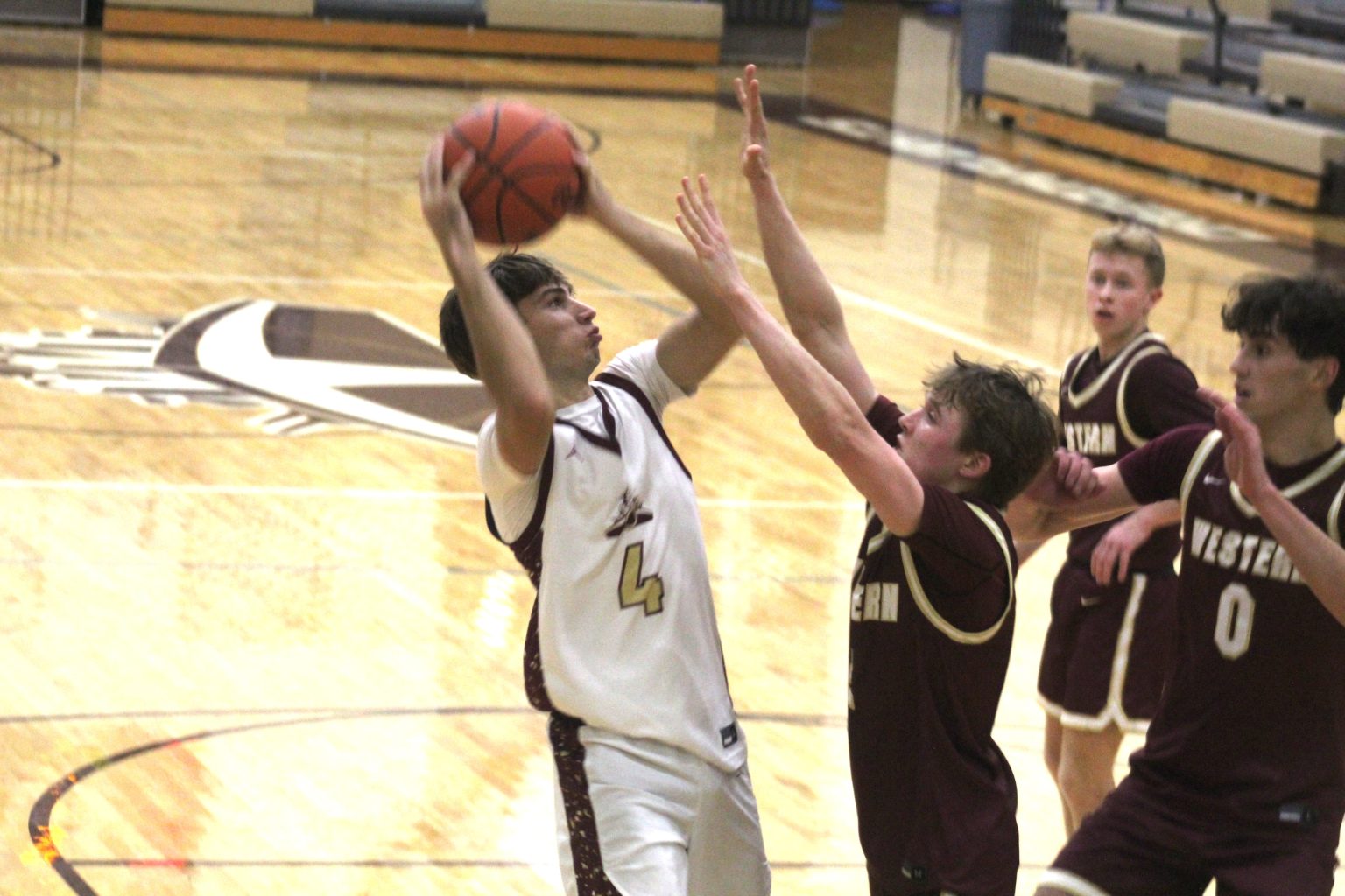 Dexter Basketball Splits Pair to Open Season - The Sun Times News
