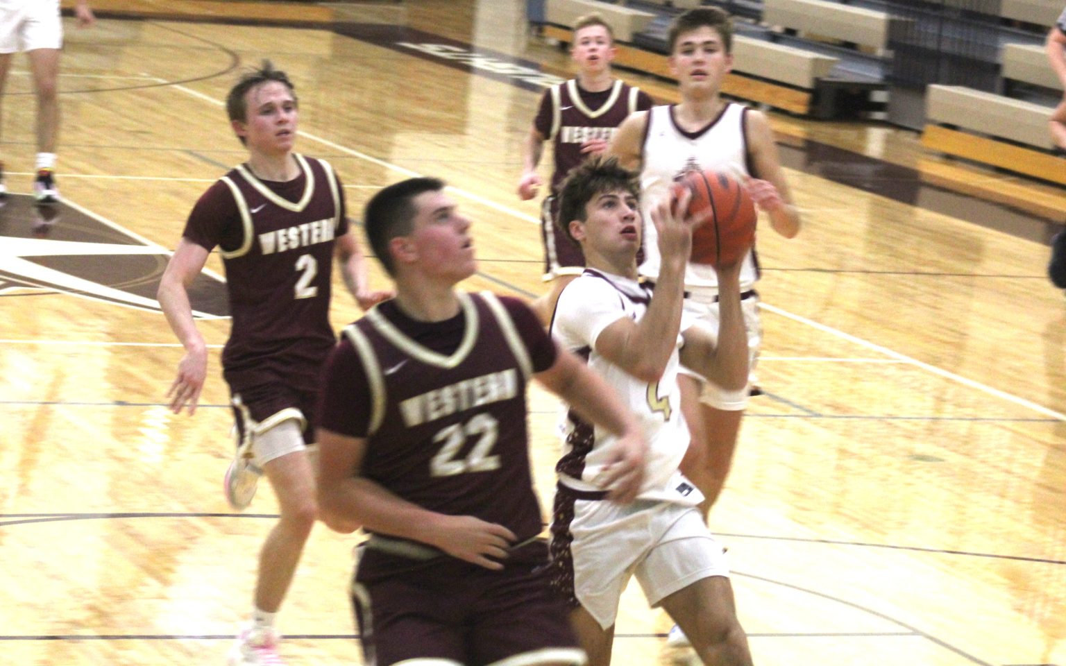 Dexter Basketball Splits Pair to Open Season - The Sun Times News